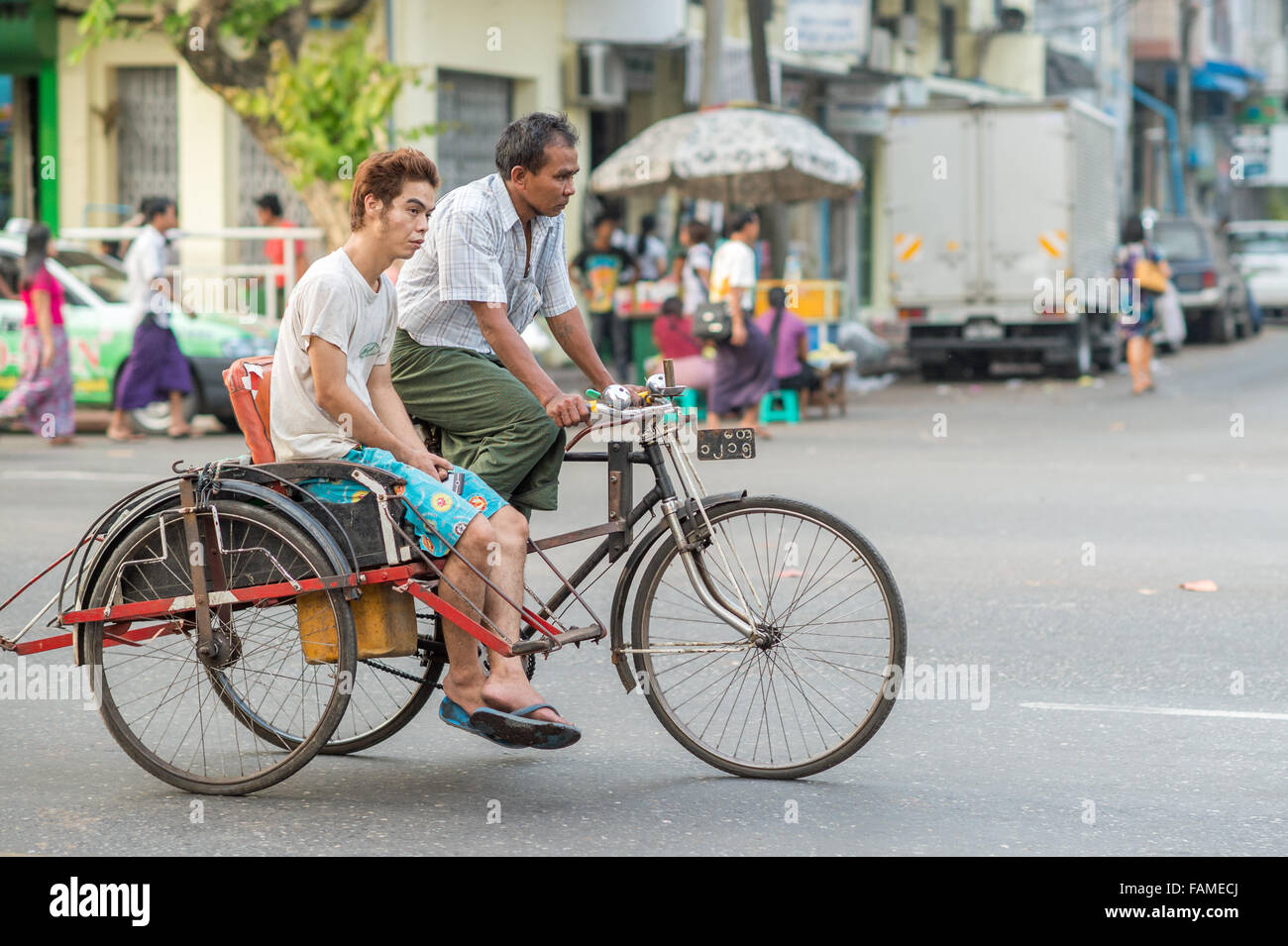 Burmese street scene in Chinatown of Yangon Stock Photo - Alamy