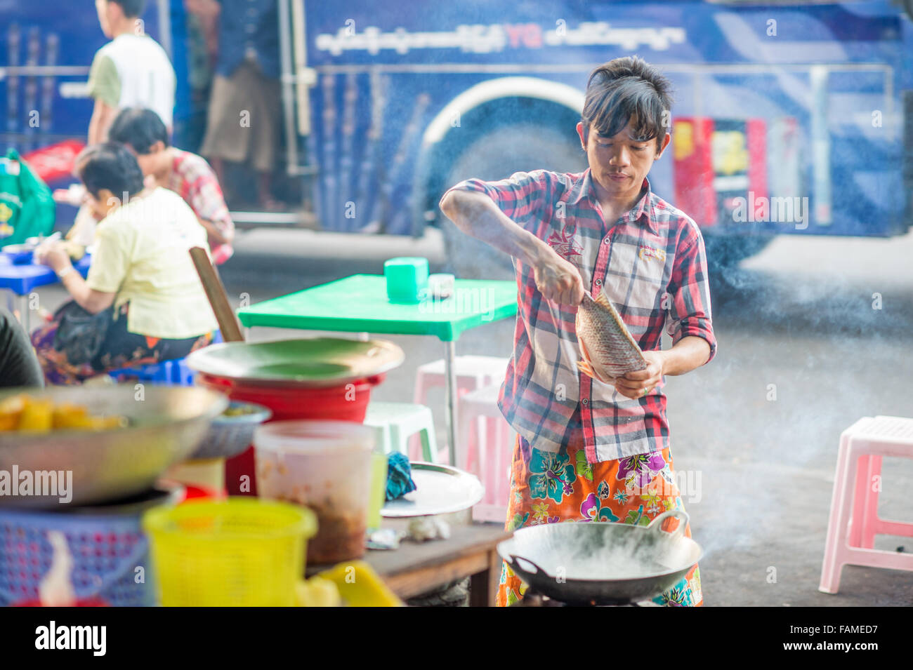 Burmese street scene in Chinatown of Yangon Stock Photo - Alamy