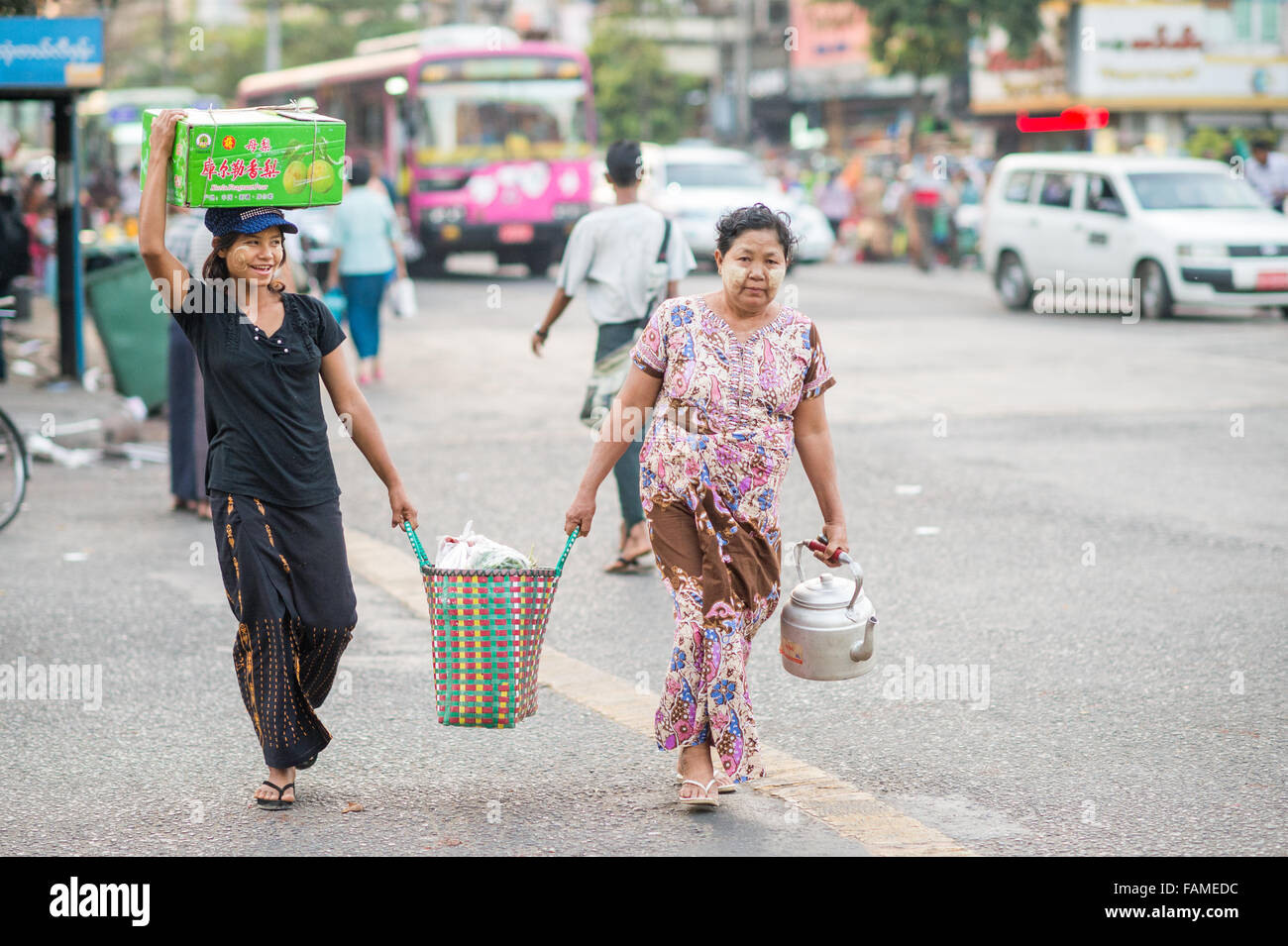 Burmese street scene in Chinatown of Yangon Stock Photo - Alamy