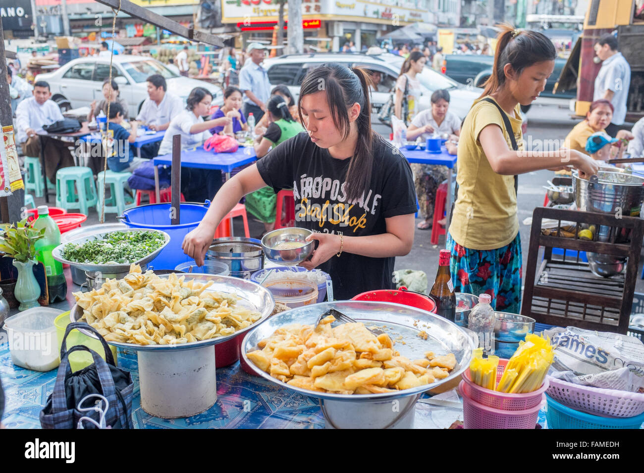 Burmese street scene in Chinatown of Yangon Stock Photo - Alamy
