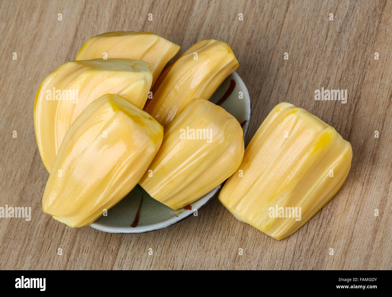 Tropical Jack Fruit on the wood background Stock Photo - Alamy