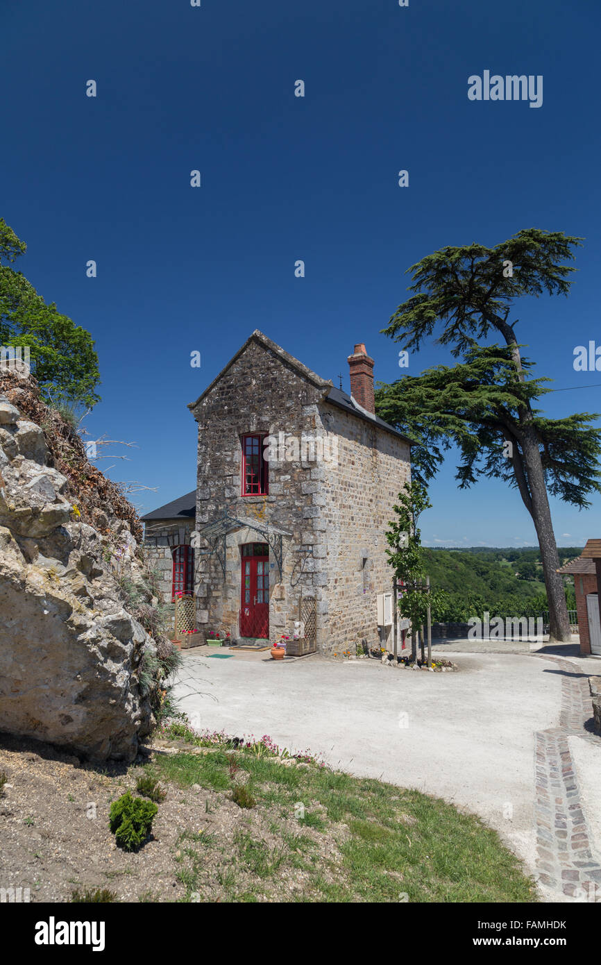 The historic medieval gate house and entrance to Domfront Castle, in ...