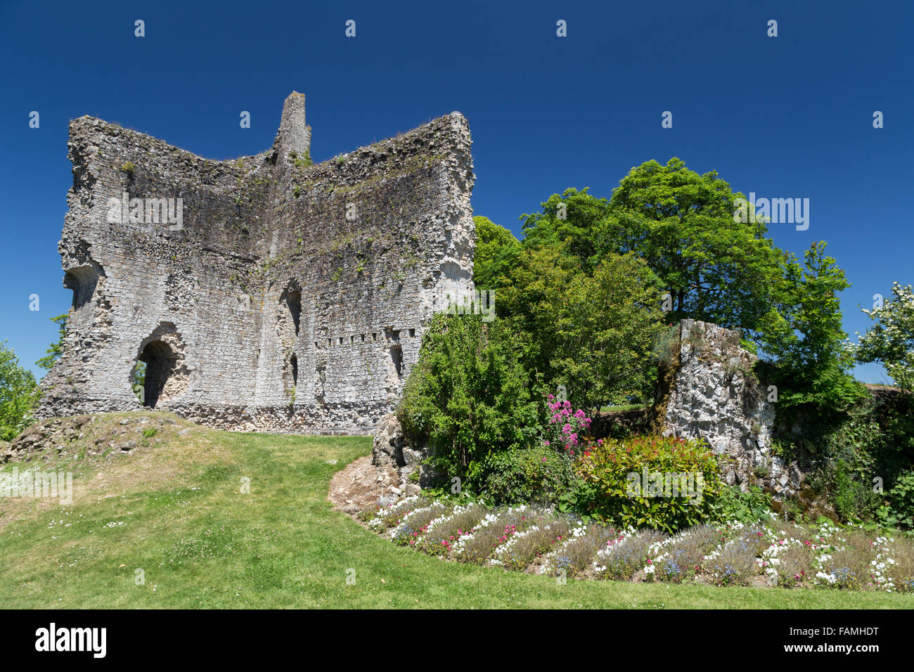 The ruined walls and architecture of the historic medieval Domfront ...