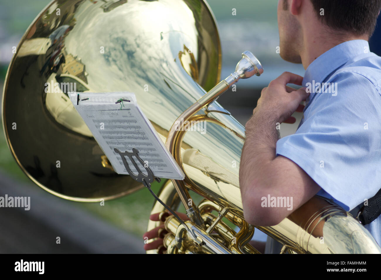 A man holds a tuba Stock Photo - Alamy