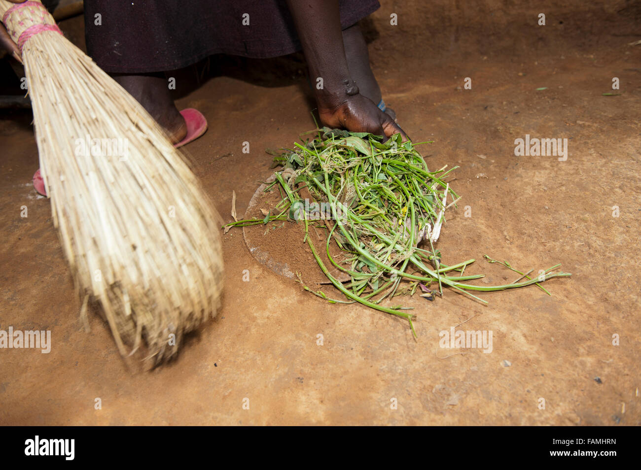 Woman cleaning home africa hi-res stock photography and images - Alamy