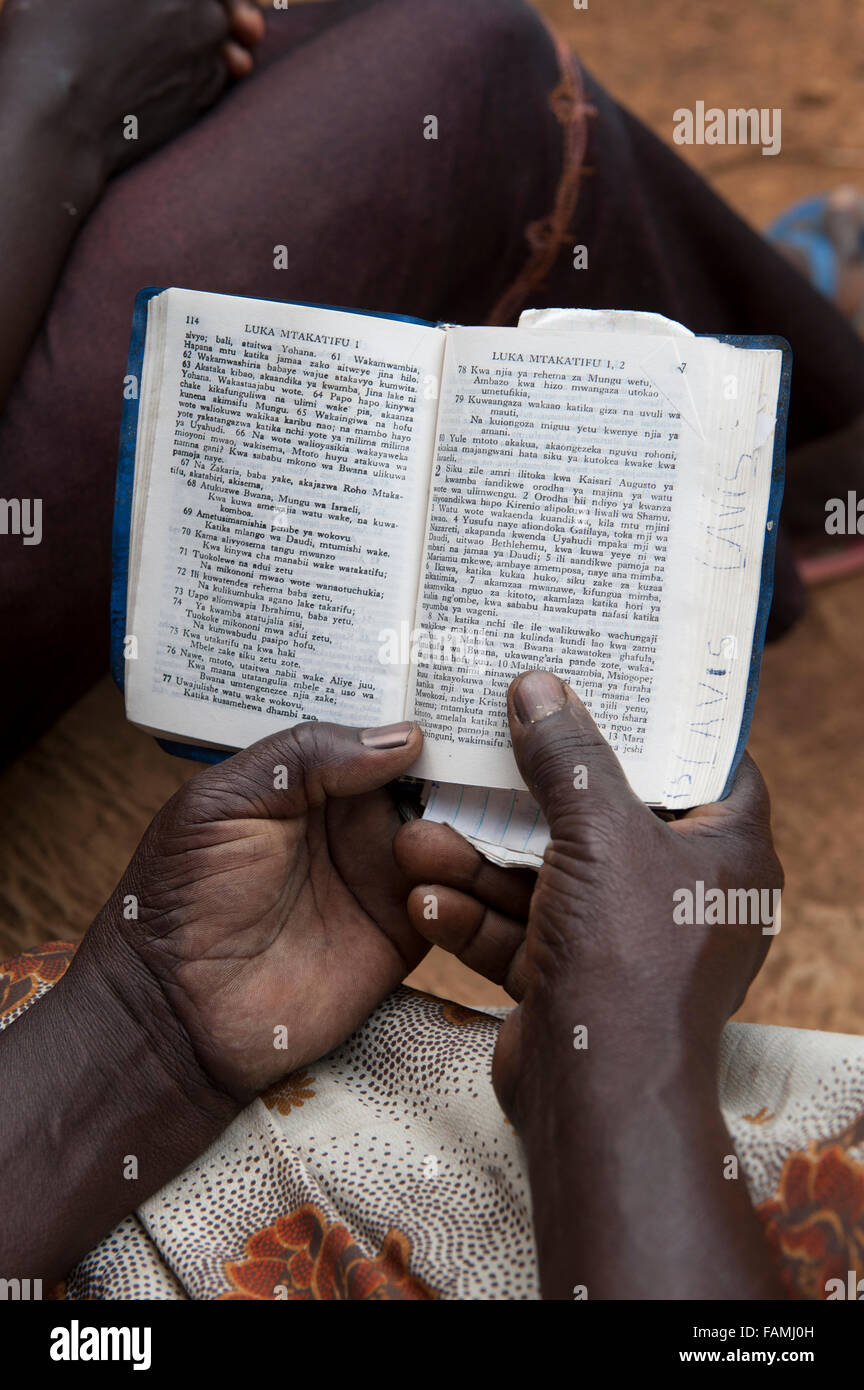 African woman reading bible hi-res stock photography and images - Alamy