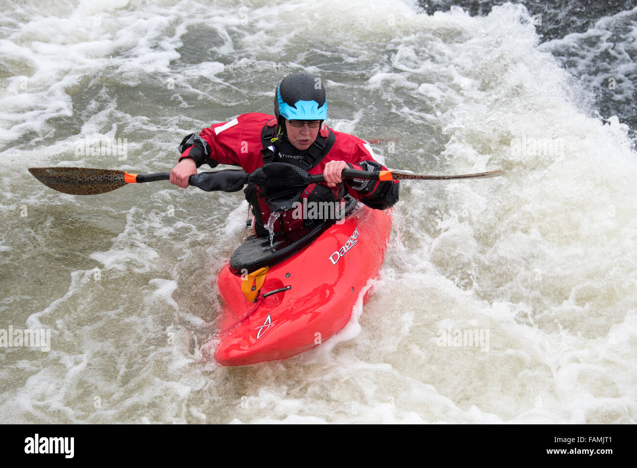 Woman kayaking in fast water Stock Photo - Alamy