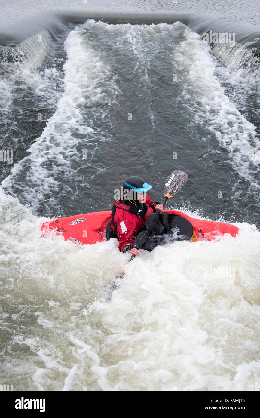 Woman kayaking in fast water Stock Photo - Alamy