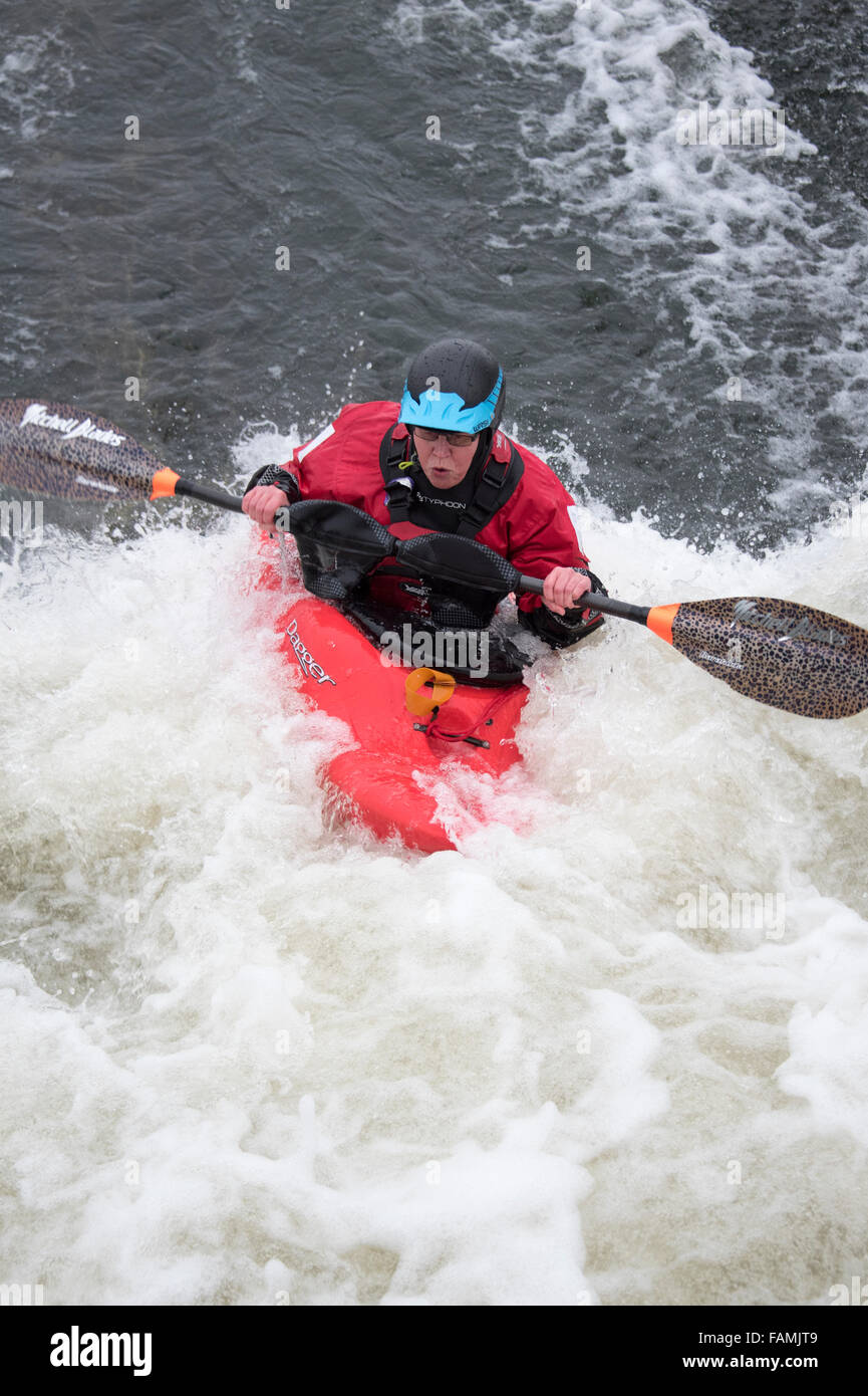 Woman kayaking in fast water Stock Photo - Alamy
