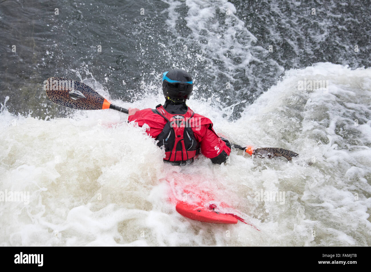 Man kayaking in fast water Stock Photo - Alamy