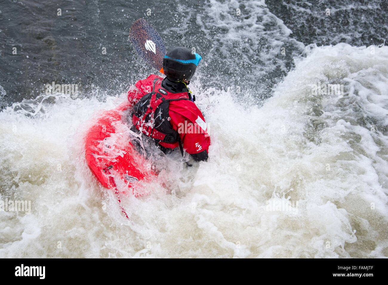 Man kayaking in fast water Stock Photo - Alamy
