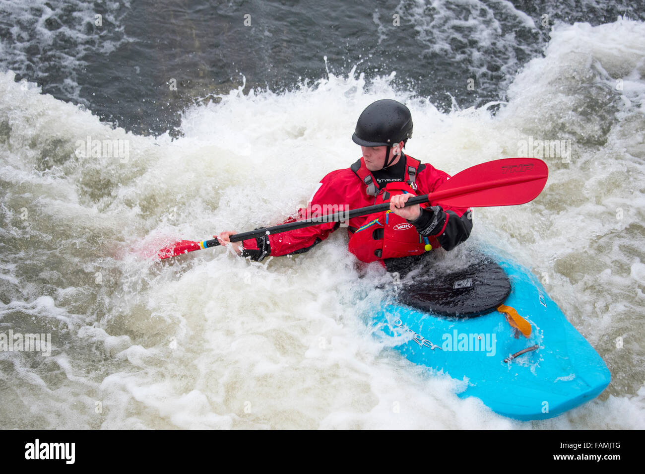 Man kayaking in fast water Stock Photo - Alamy