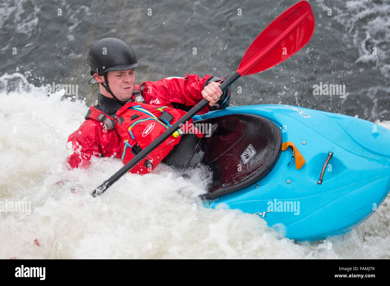 Man kayaking in fast water Stock Photo - Alamy