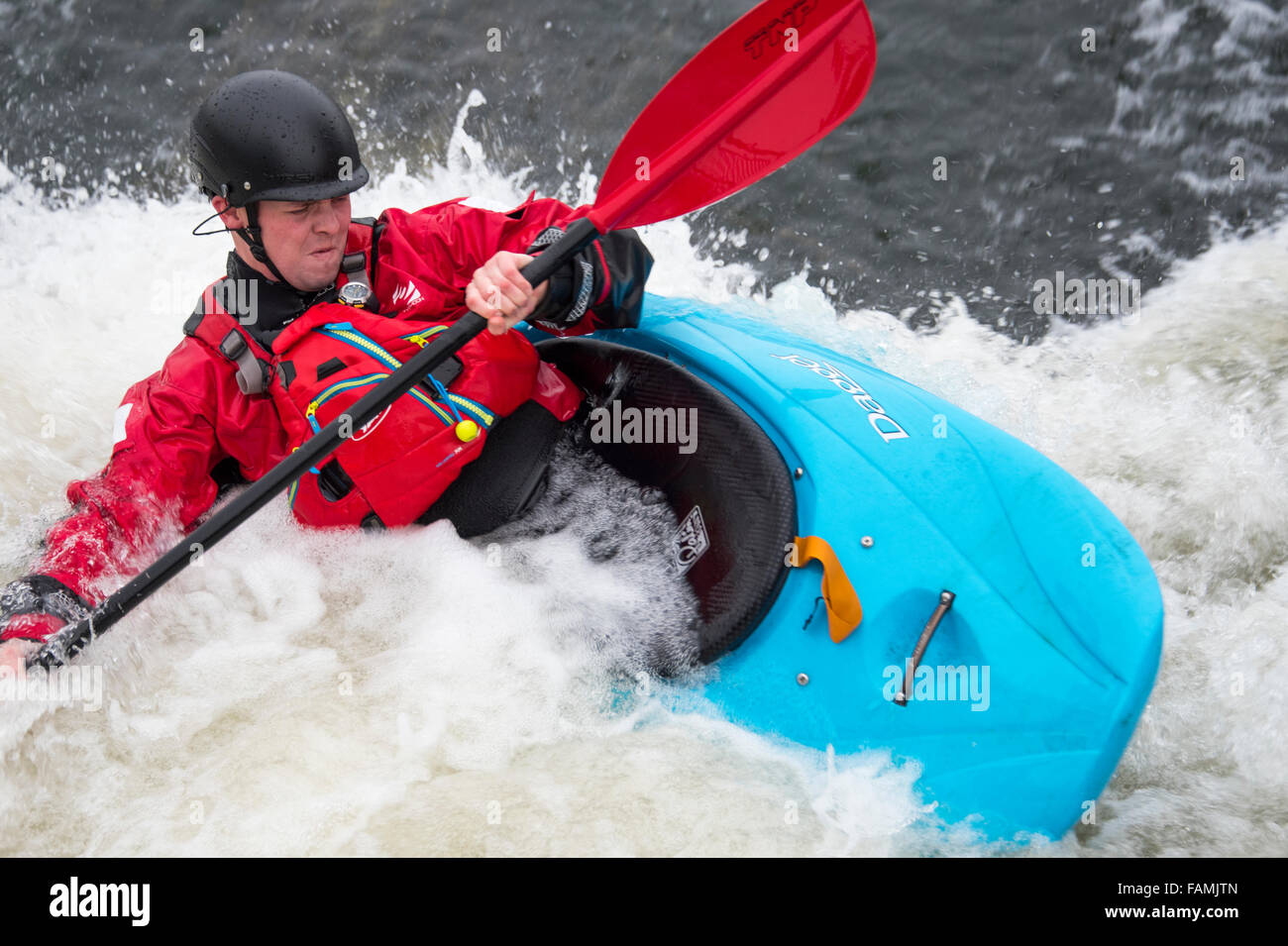 Man kayaking in fast water Stock Photo - Alamy