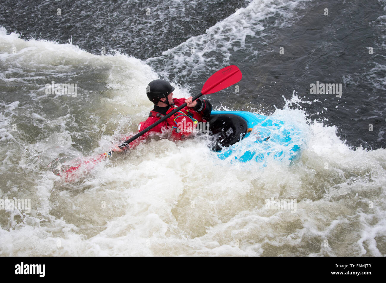 Man kayaking in fast water Stock Photo - Alamy