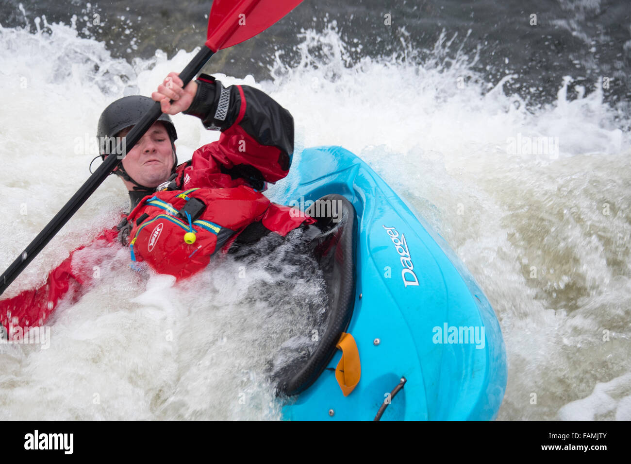 Man kayaking in fast water Stock Photo - Alamy