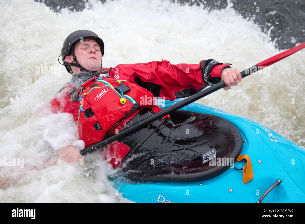 Man kayaking in fast water Stock Photo - Alamy