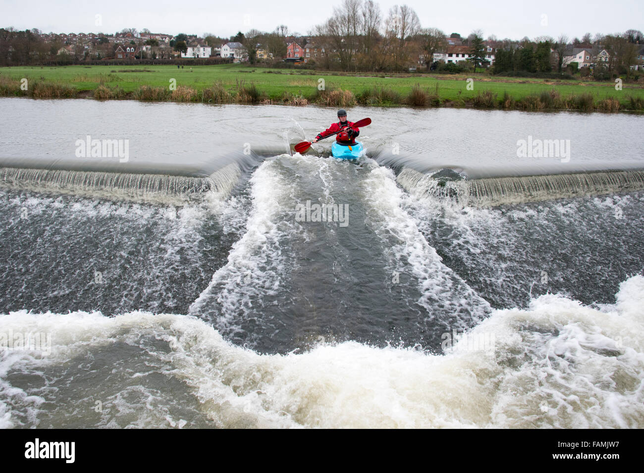 Man kayaking in fast water Stock Photo - Alamy