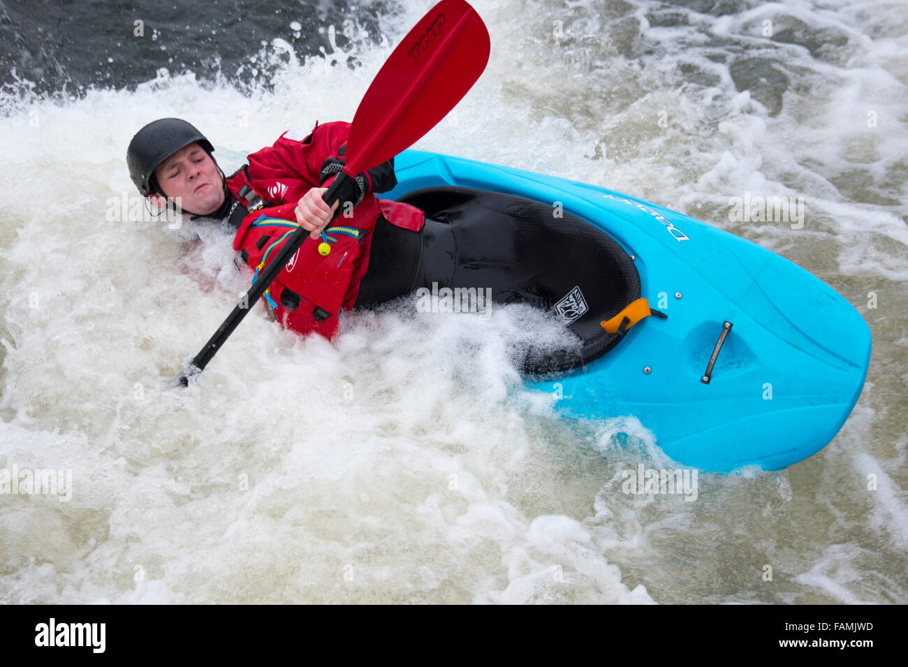 Man kayaking in fast water Stock Photo - Alamy