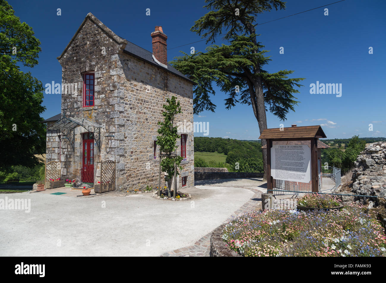 The historic medieval gate house and entrance to Domfront Castle, in ...