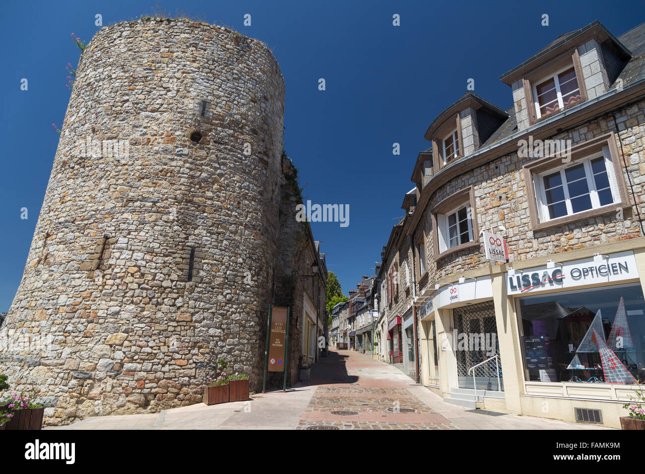 The historic medieval gate tower entrance to Domfront Castle, route to ...