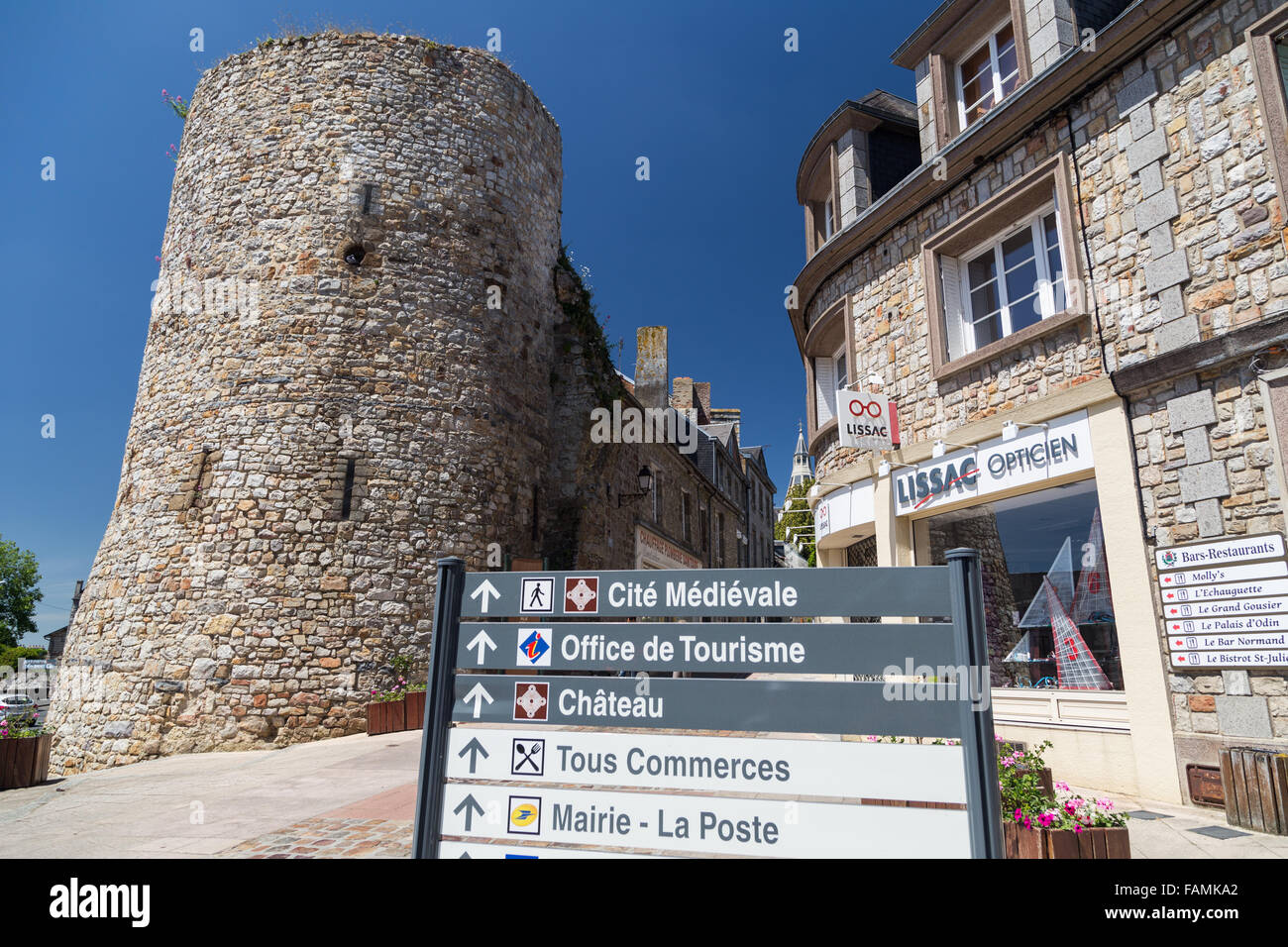 The historic medieval gate tower entrance to Domfront Castle, street ...