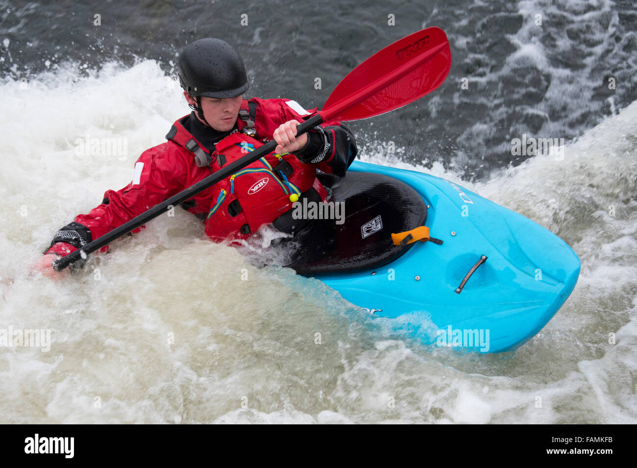 Man kayaking in fast water Stock Photo - Alamy