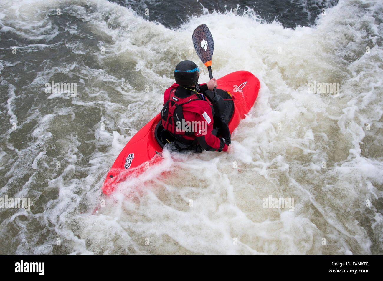 Man kayaking in fast water Stock Photo - Alamy