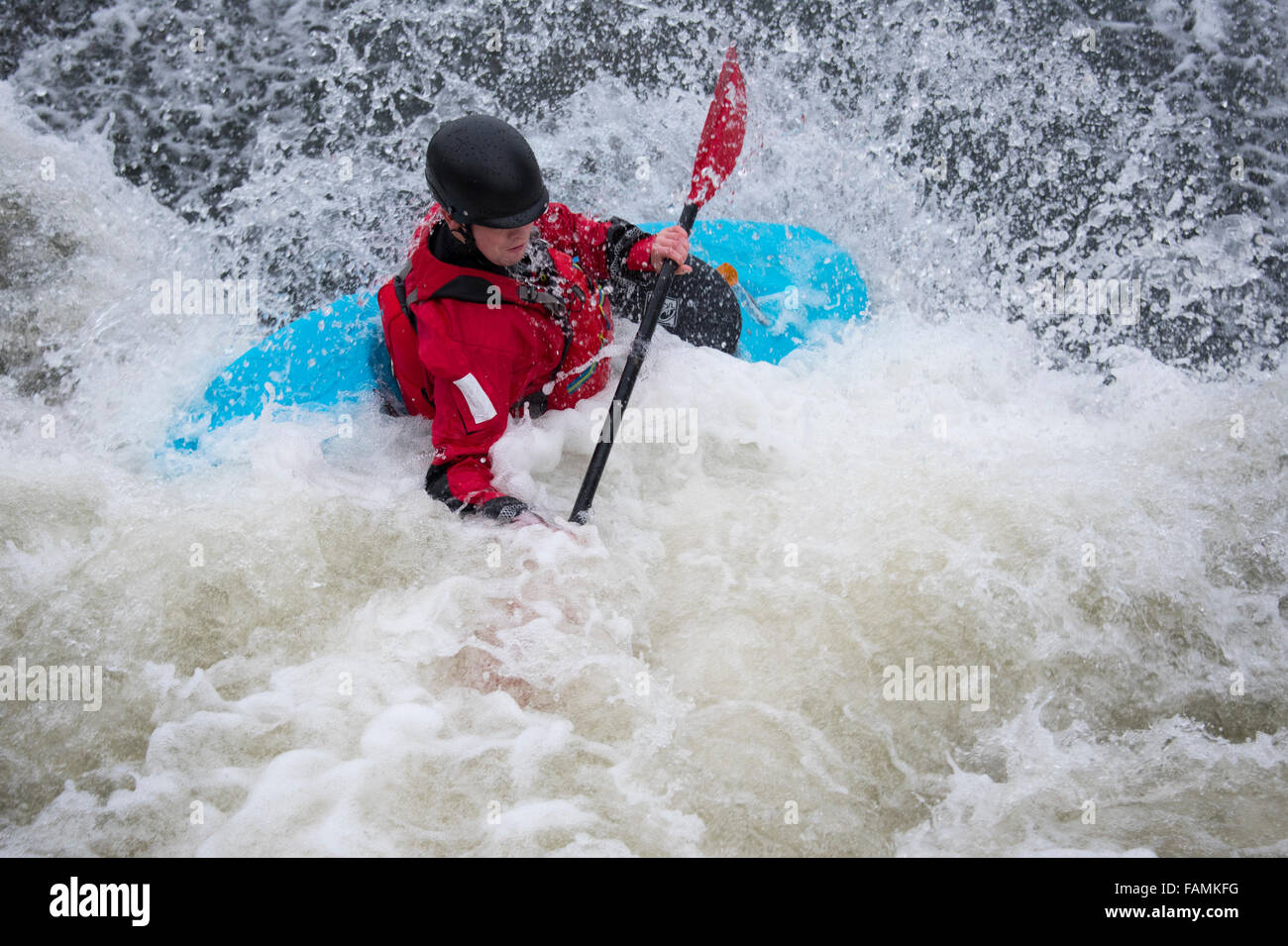Man kayaking in fast water Stock Photo - Alamy
