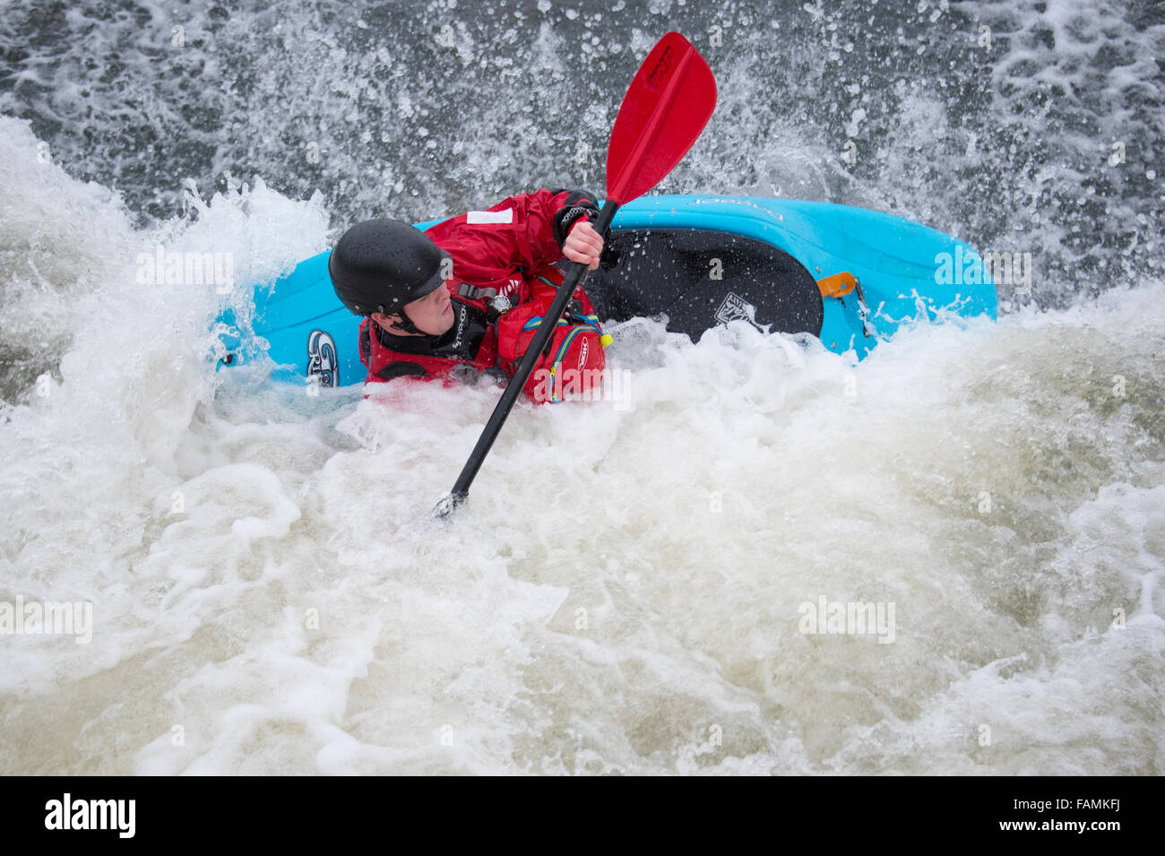 Man kayaking in fast water Stock Photo - Alamy