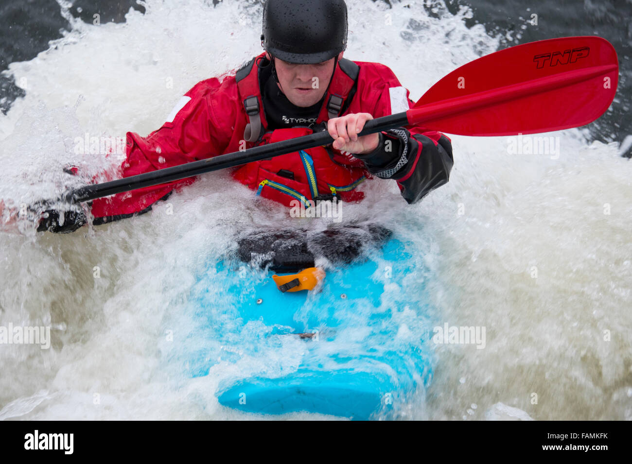 Man kayaking in fast water Stock Photo - Alamy