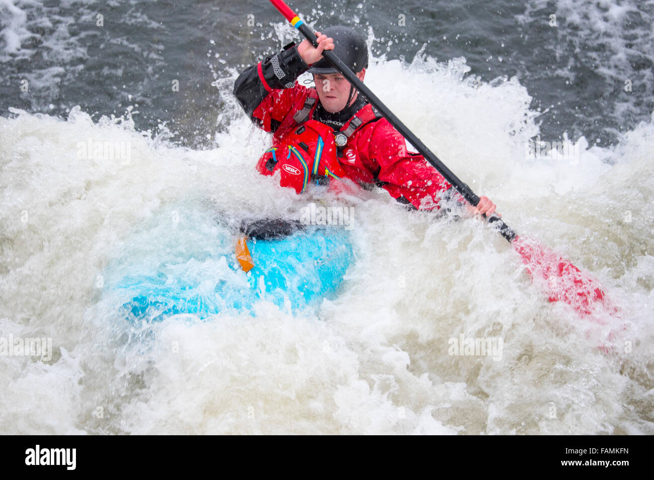 Man kayaking in fast water Stock Photo - Alamy