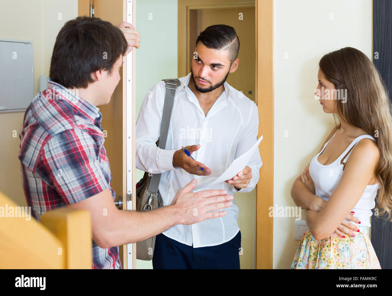 Banker came home to the couple clamouring credit repayment Stock Photo ...