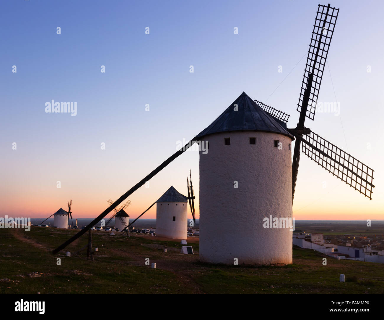 Wind mills at field in dusk time Stock Photo - Alamy
