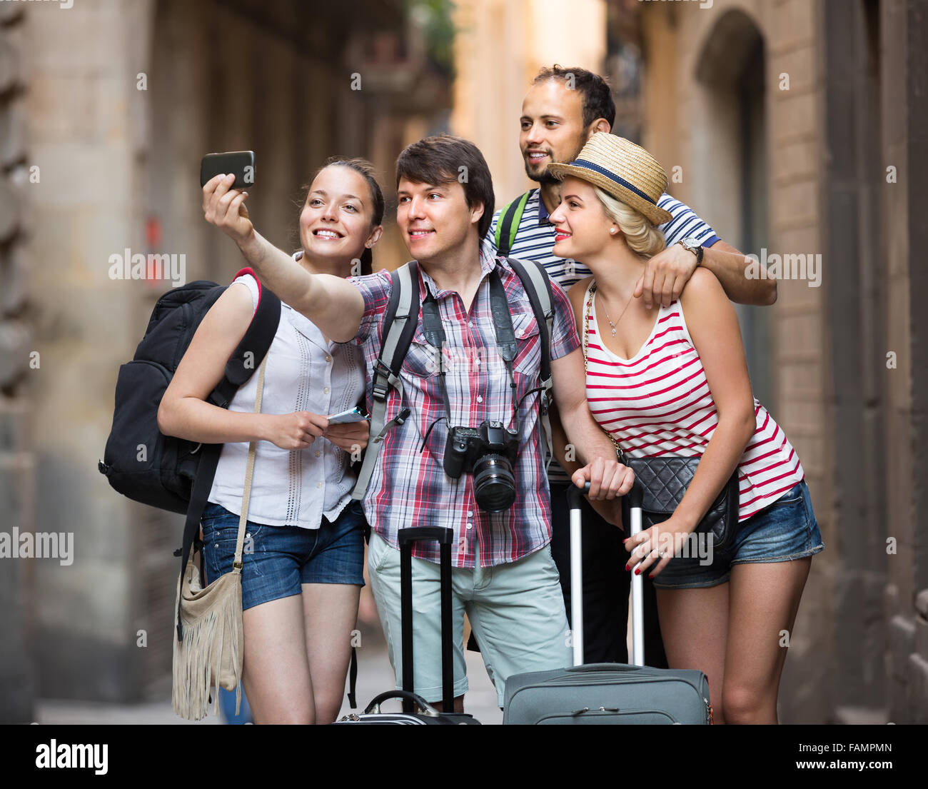 Cheerful travelers doing selfie in the sightseeing tour. Selective ...