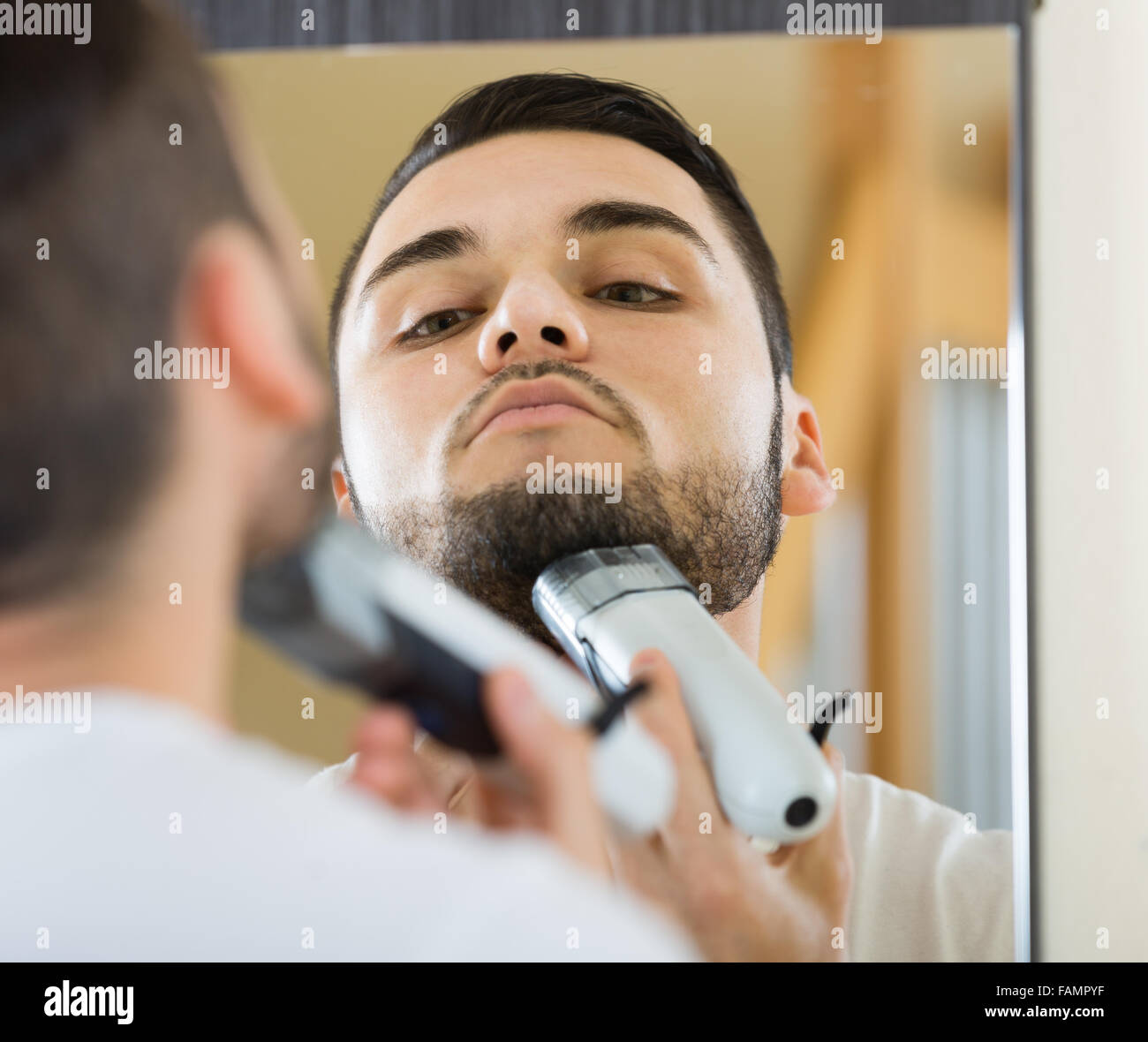 Russian man looking mirror shaving hi-res stock photography and images ...