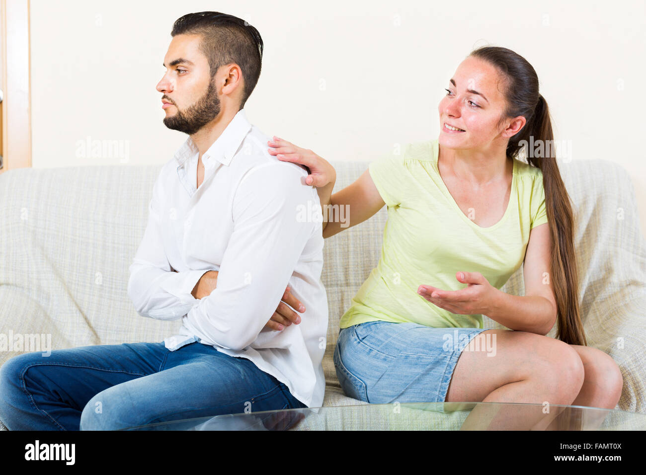 happy american wife listening husband Stock Photo - Alamy