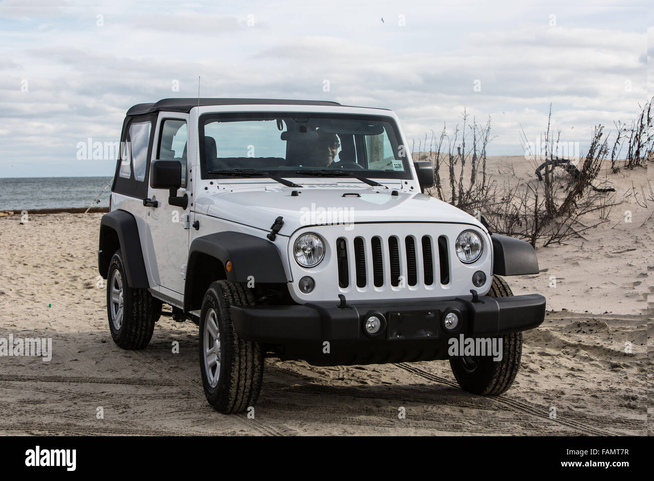Jeep on the beach Stock Photo - Alamy