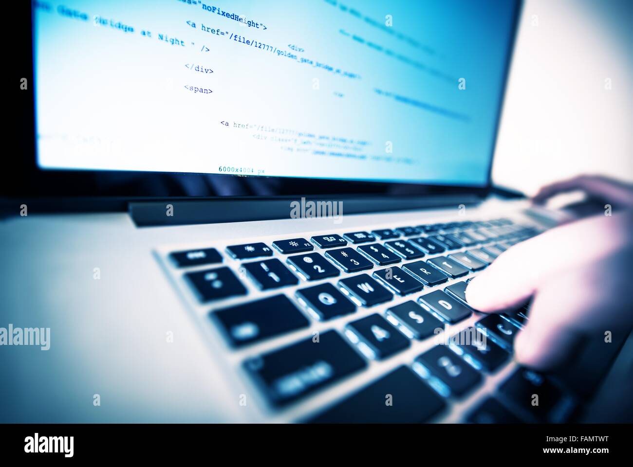 Laptop Computer Works. Web Programmer at Work. Men Browsing Website ...