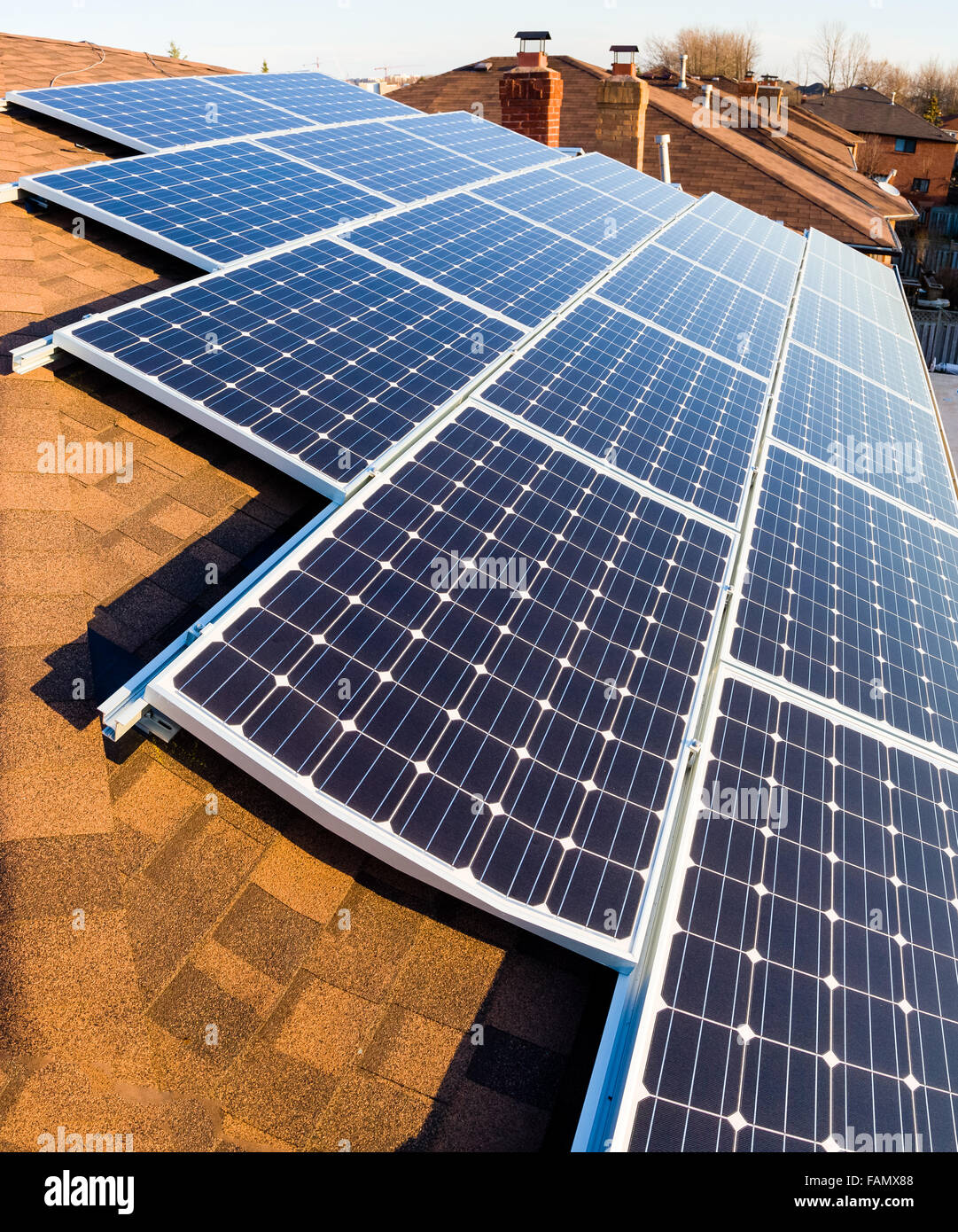 Solar panels on a house roof Stock Photo - Alamy