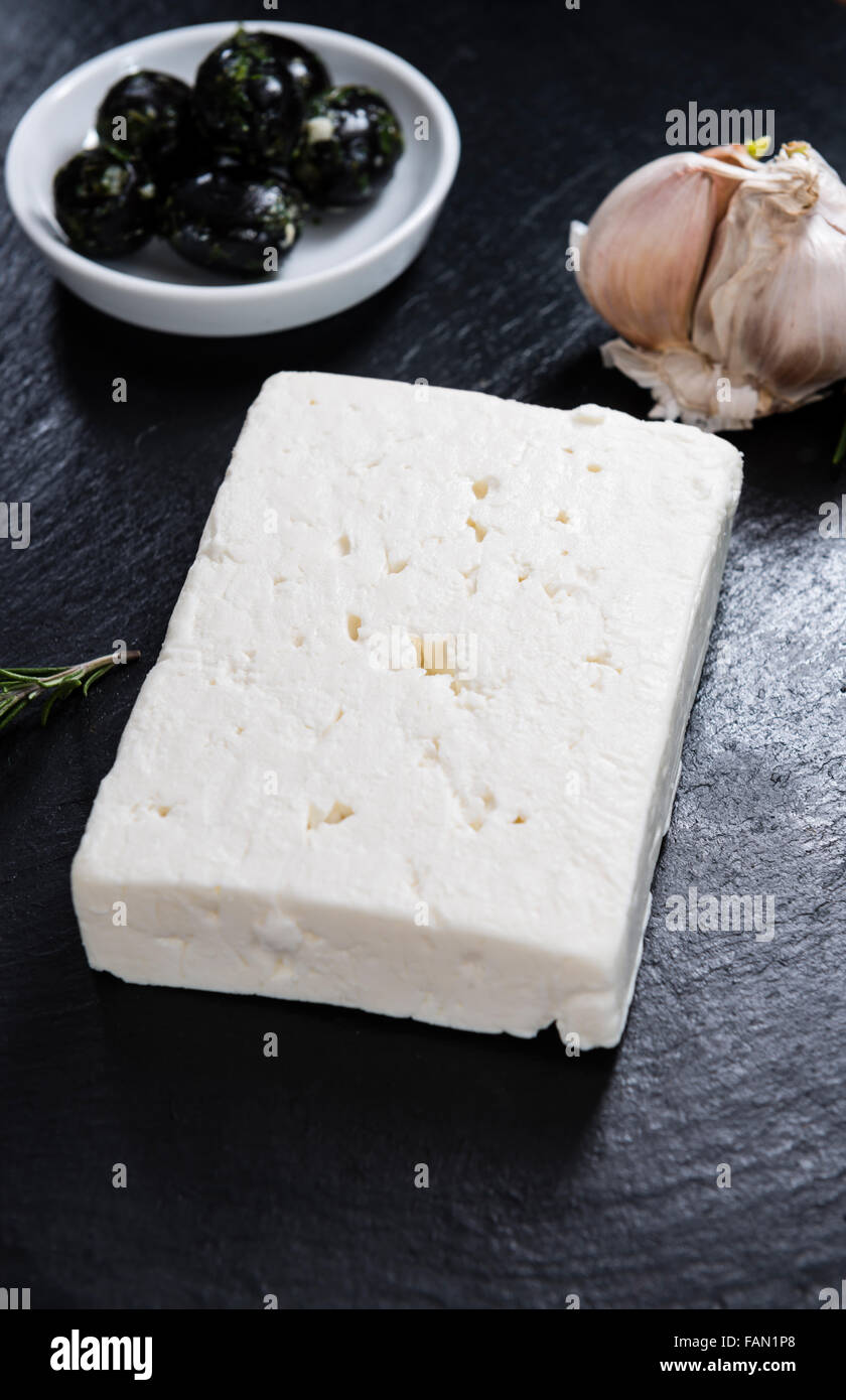 Portion of fresh cutted Feta Cheese (as detailed close-up shot Stock ...