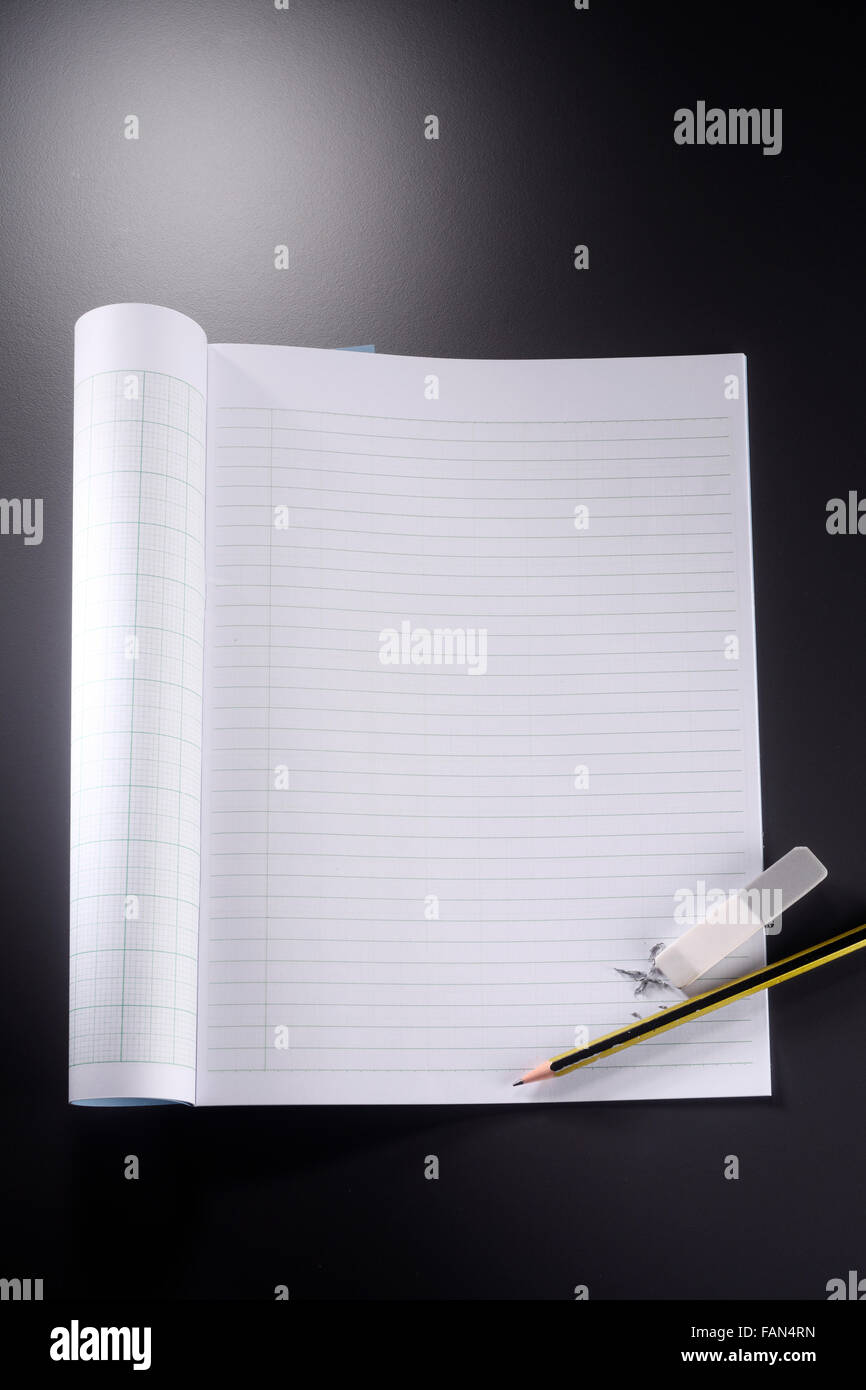 school notebook with pencil and eraser Stock Photo - Alamy
