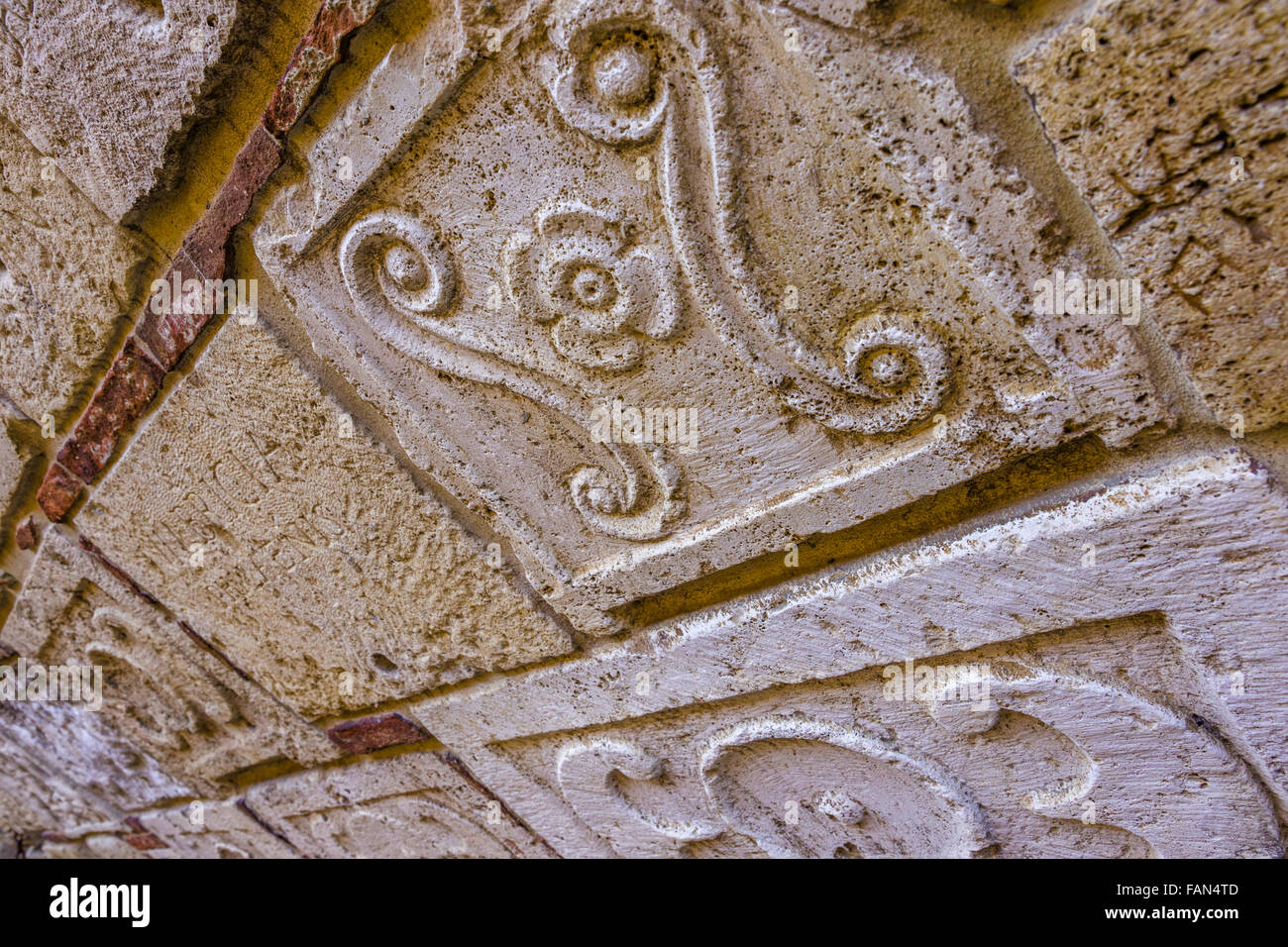 aged artifacts in wall, Tuscany Stock Photo - Alamy
