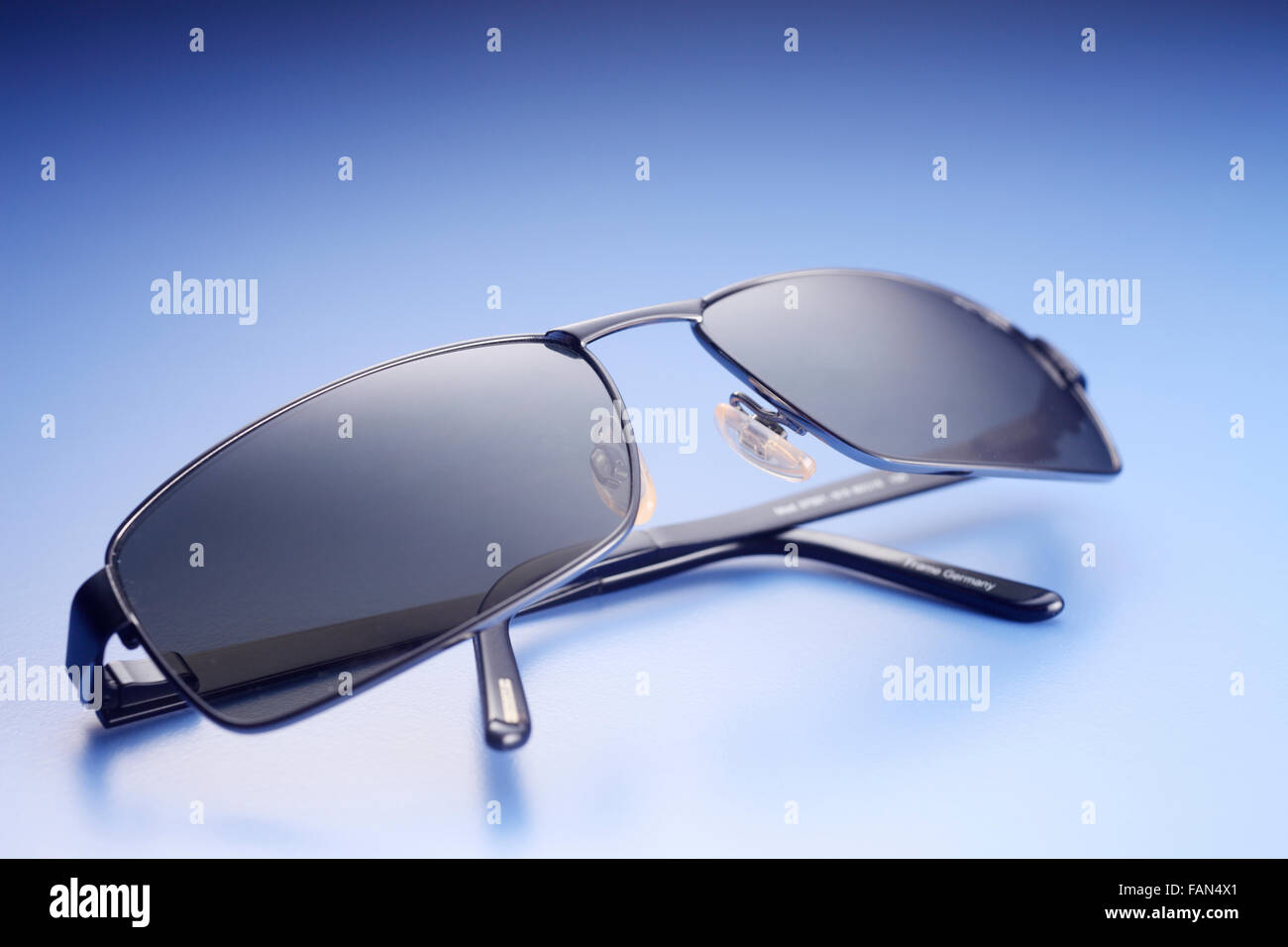 Eye Glasses on the blue background Stock Photo - Alamy