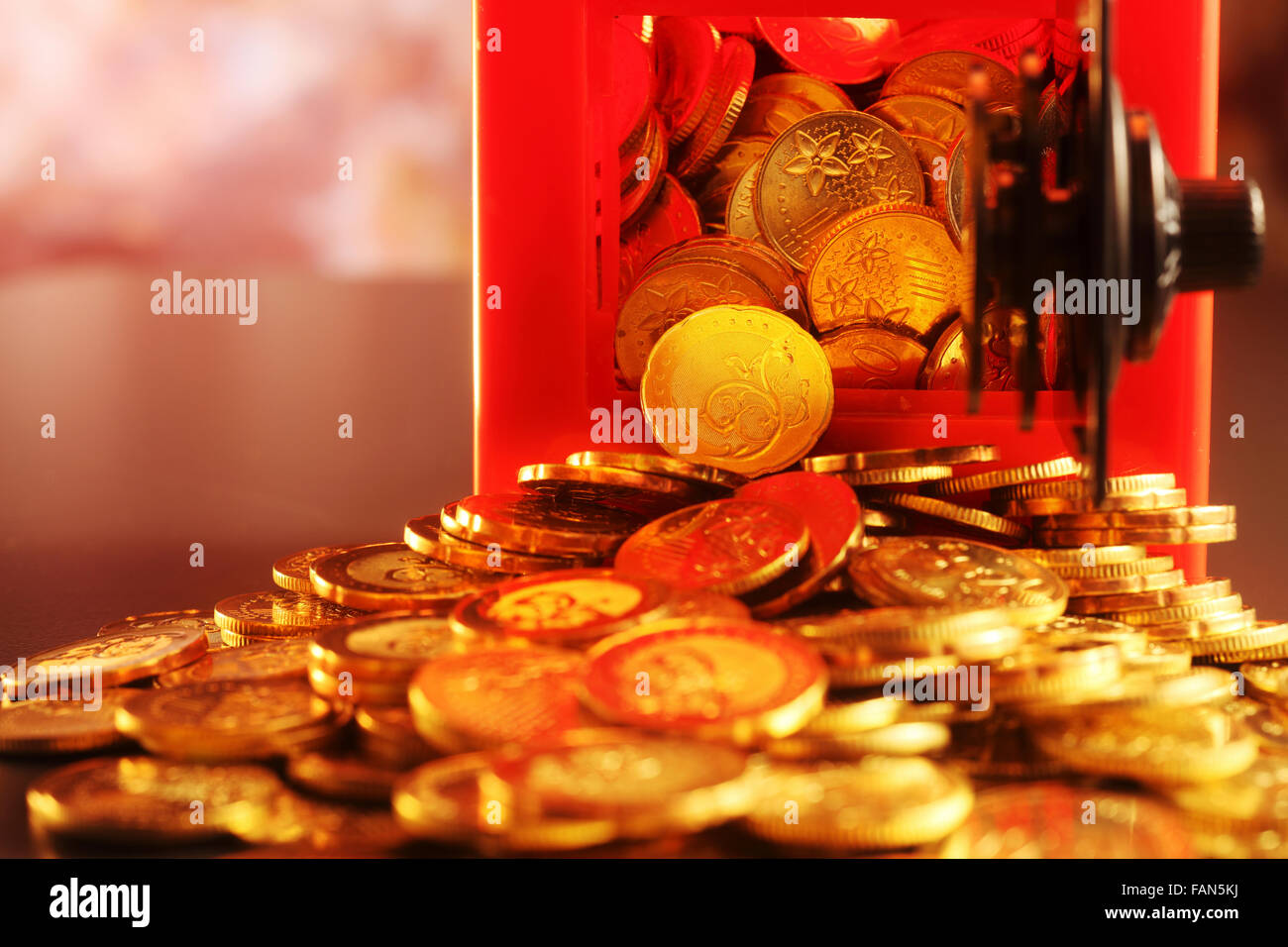 Pouring gold coins hi-res stock photography and images - Alamy