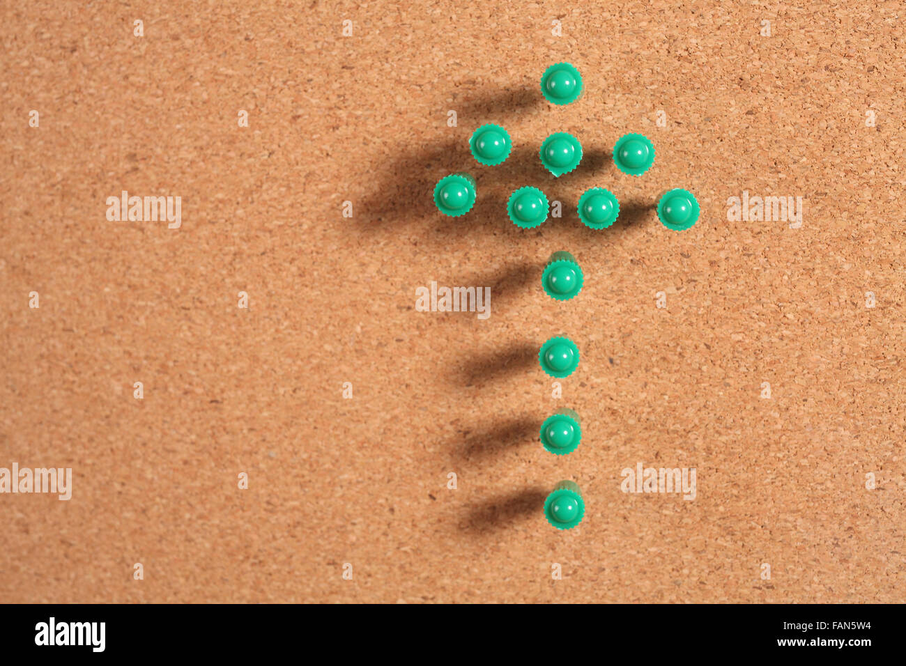 push pin form a arrow sign Stock Photo - Alamy