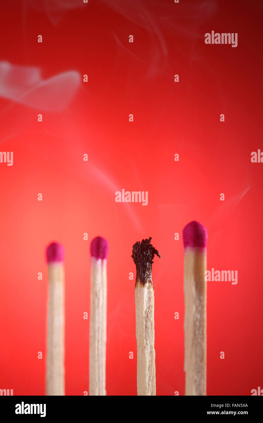 close up burnt mstches with smoke Stock Photo - Alamy