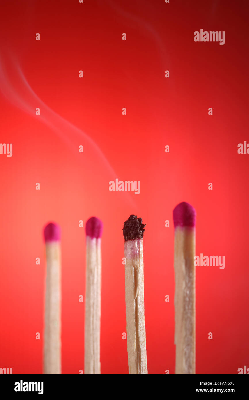 burnt match stick with smoke Stock Photo - Alamy