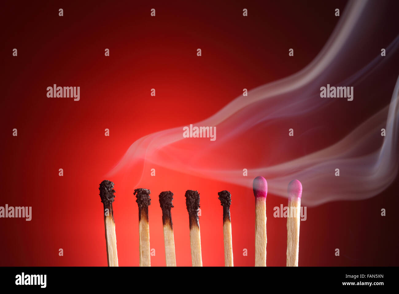 burnt match stick with smoke Stock Photo - Alamy