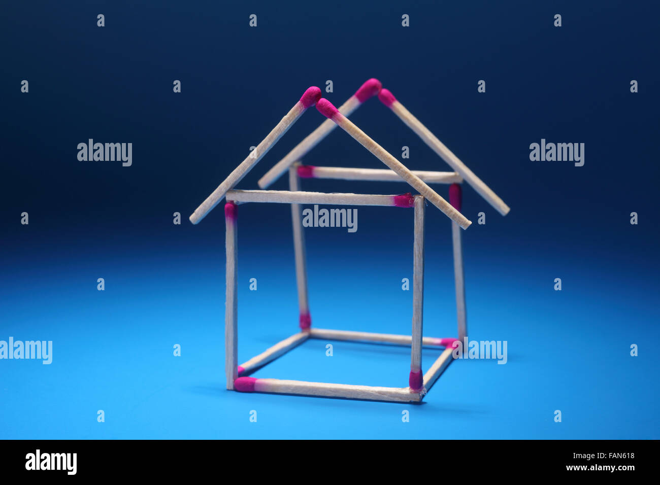 Matches in shape of house Stock Photo - Alamy